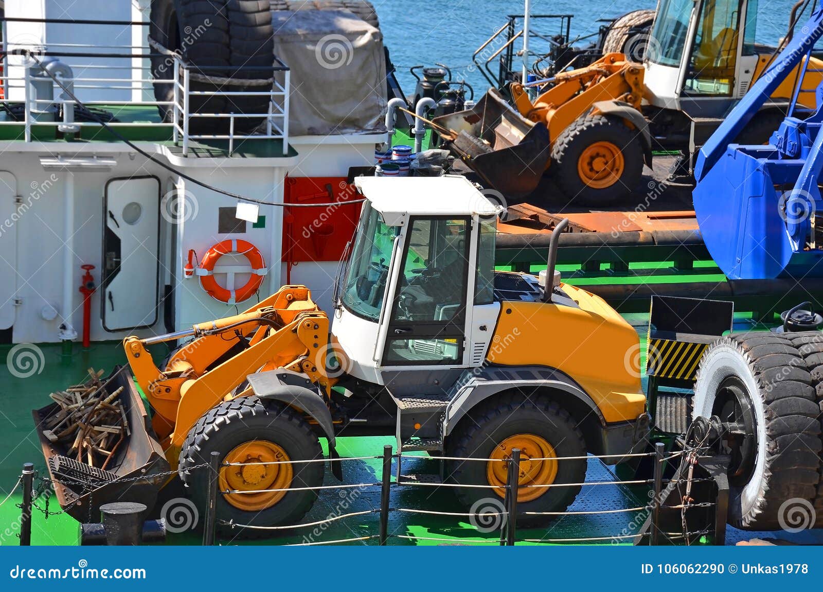Bulldozer On A Floating Pontoon Stock Photo | CartoonDealer.com #139873986