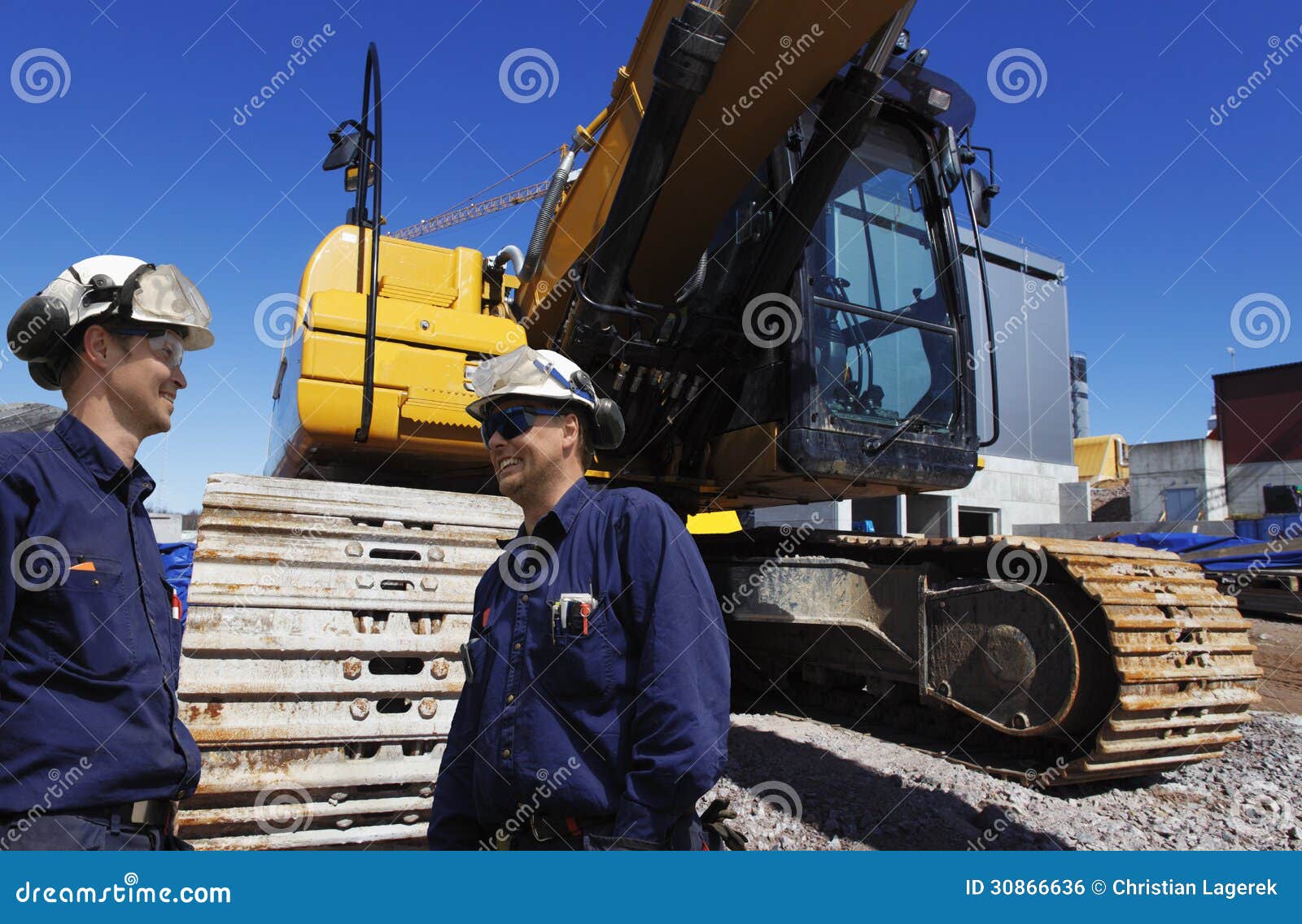 Bulldozer with Site Workers Stock Photo - Image of machinery, workers ...