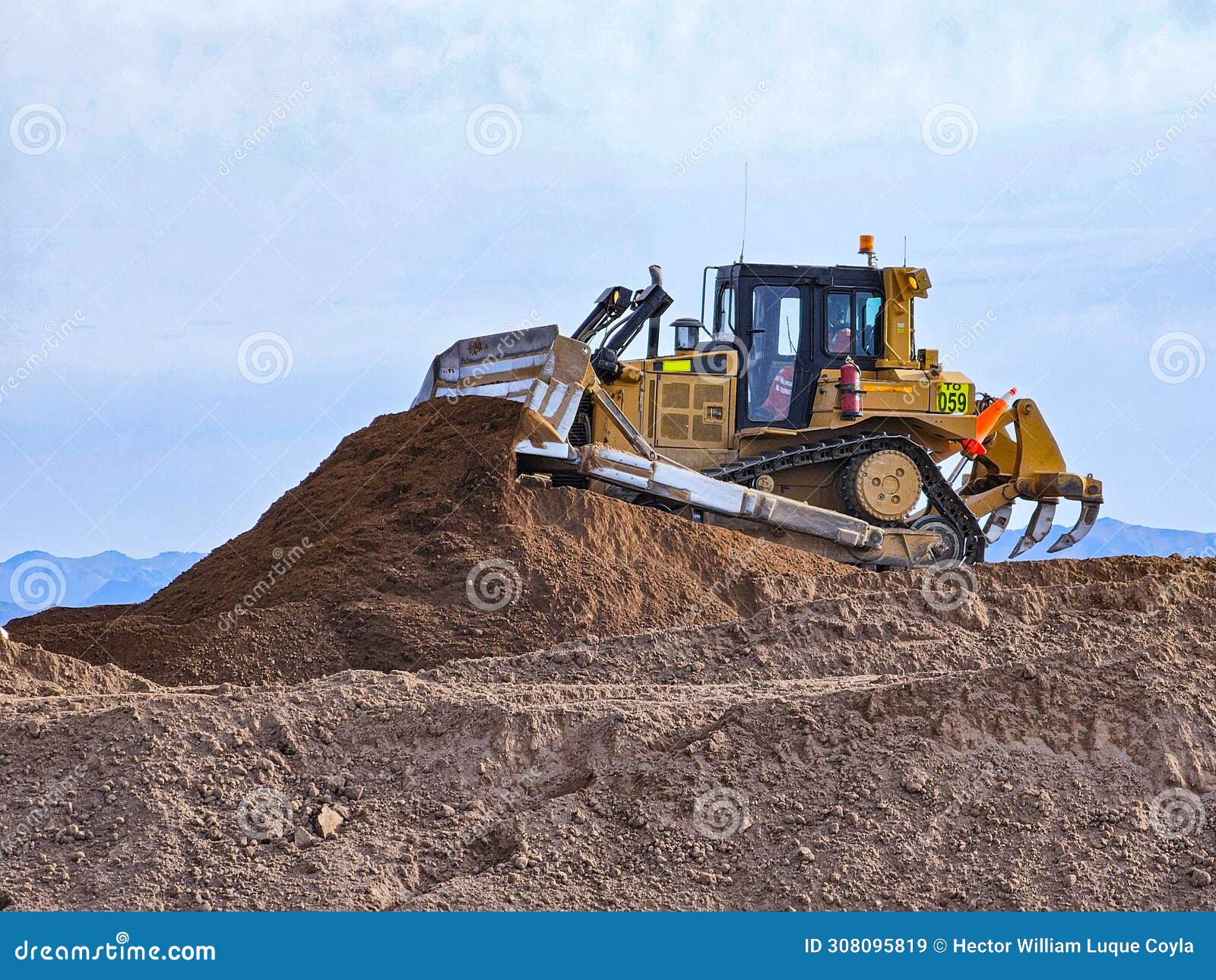 Bulldozer Type Construction Machinery Working on Bulk Earthworks in a ...