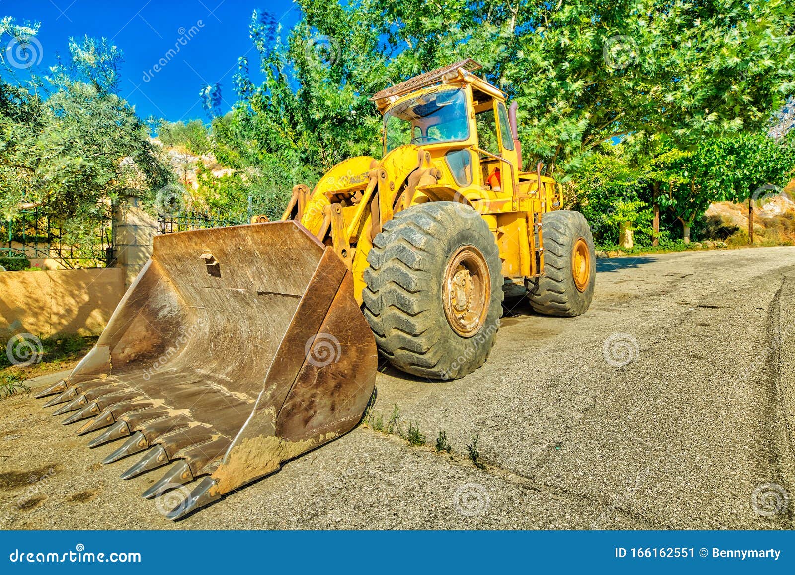 Bulldozer on wheels stock image. Image of scoop, build - 166162551