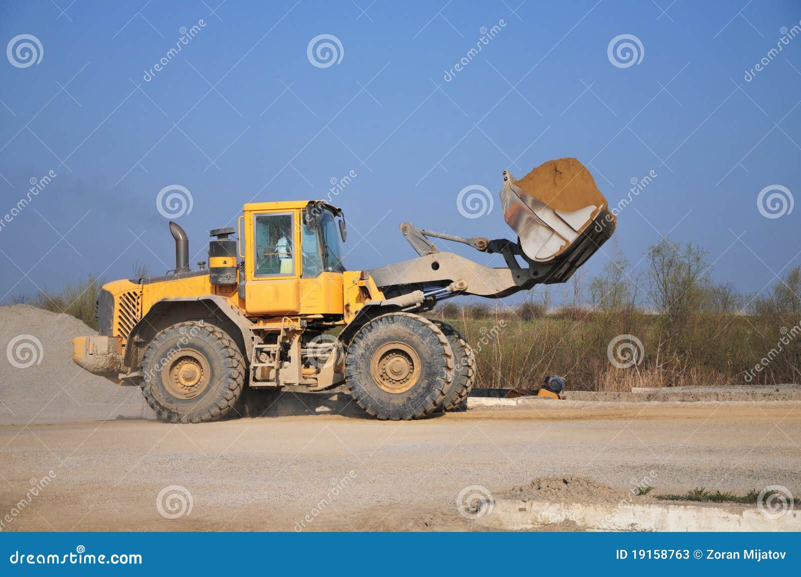 Bulldozer at work stock image. Image of site, dredge - 19158763