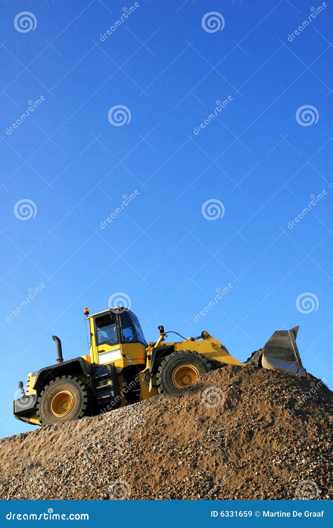 Bulldozer at Work stock image. Image of high, pile, blue - 6331659