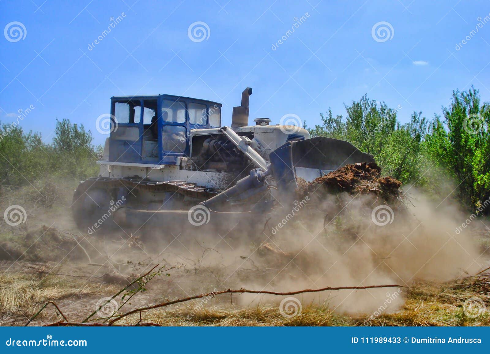 Old blue bulldozer stock image. Image of development - 111989433