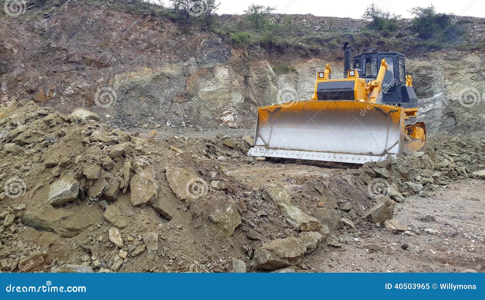 Bulldozer Working in a Quarry Stock Image - Image of workinq, rocks ...