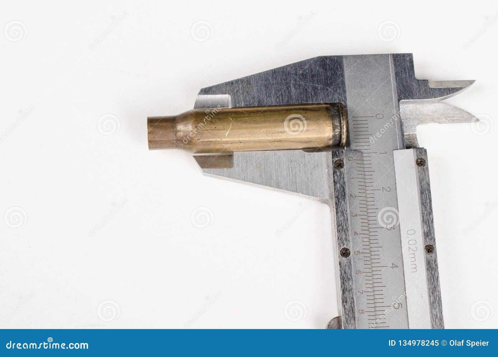 Measuring a bullet stock image. Image of calliper, bullet - 134978245