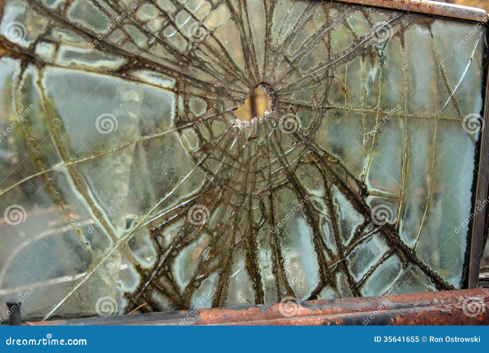 Bullet in car window glass stock image. Image of abstract - 35641655