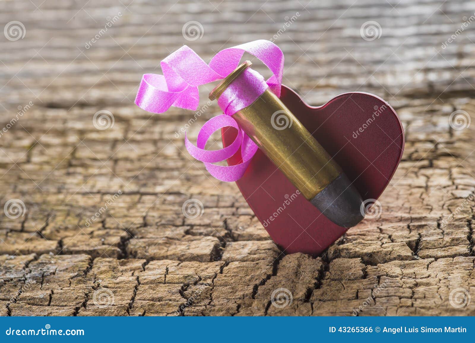 Bullet with a Heart Decorated Like a Gift Stock Photo - Image of ...