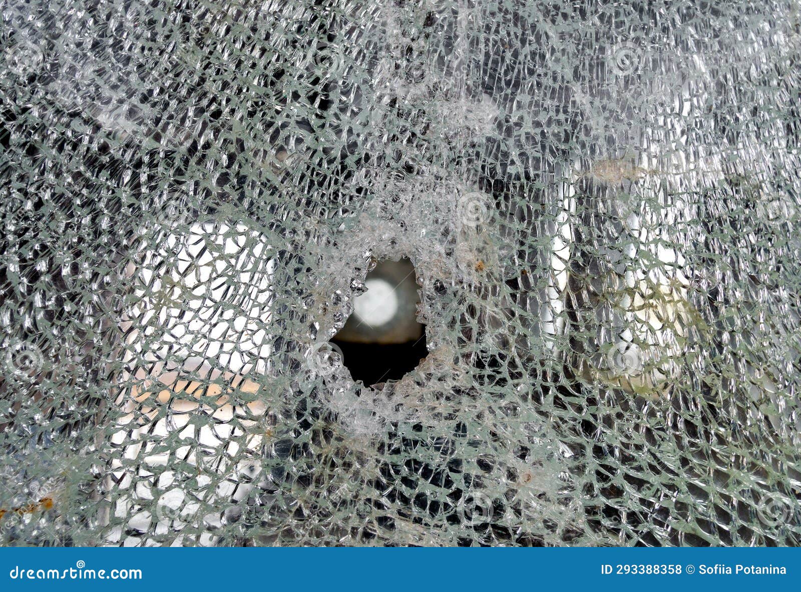 Bullet Hole in Window Glass with Cracks Abstract Background Close Stock ...