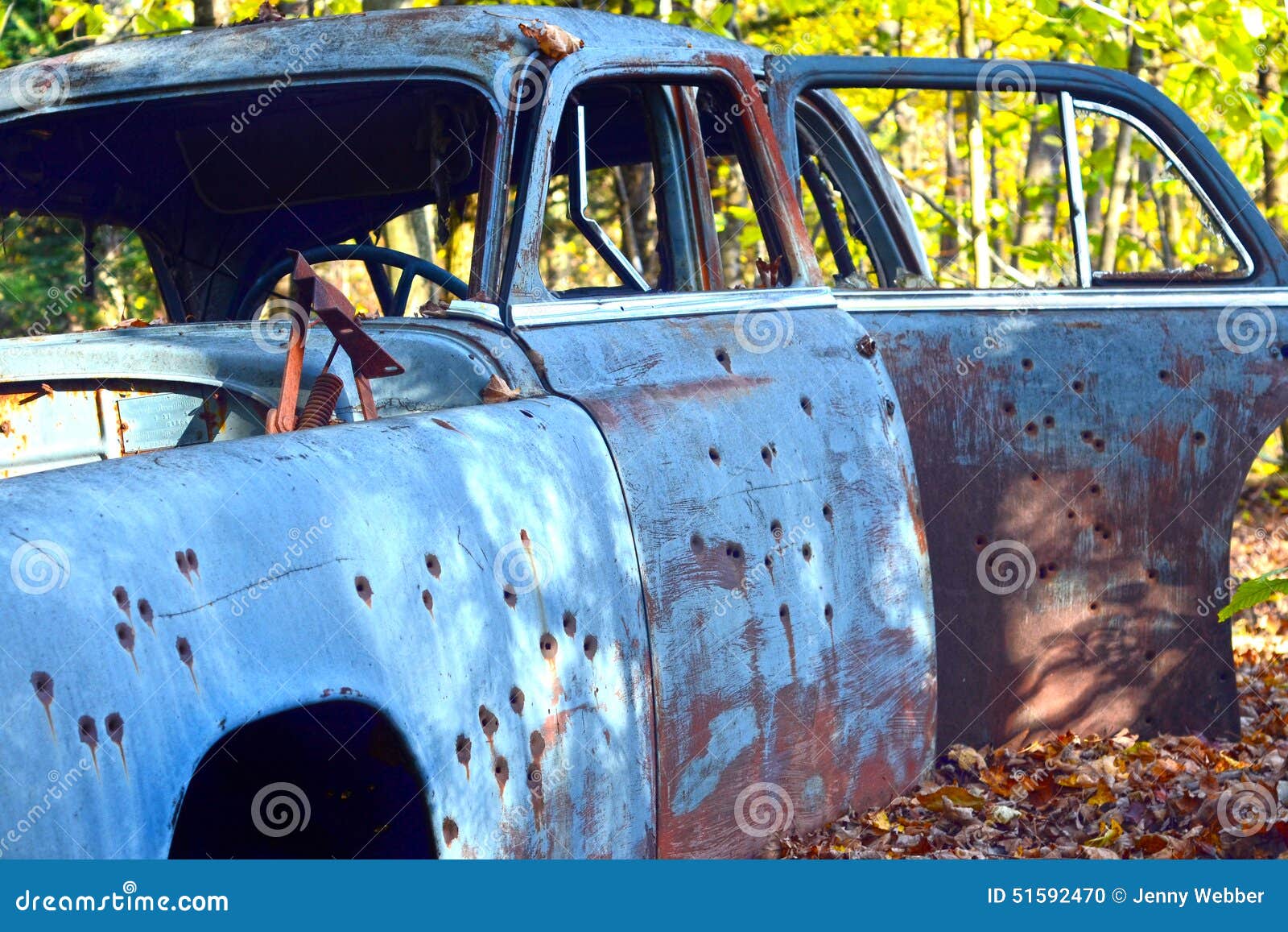 Bullet Holes in a Junk Car stock photo. Image of rust - 51592470
