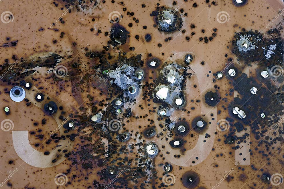 Bullet riddled stop sign stock photo. Image of rusty - 29883518