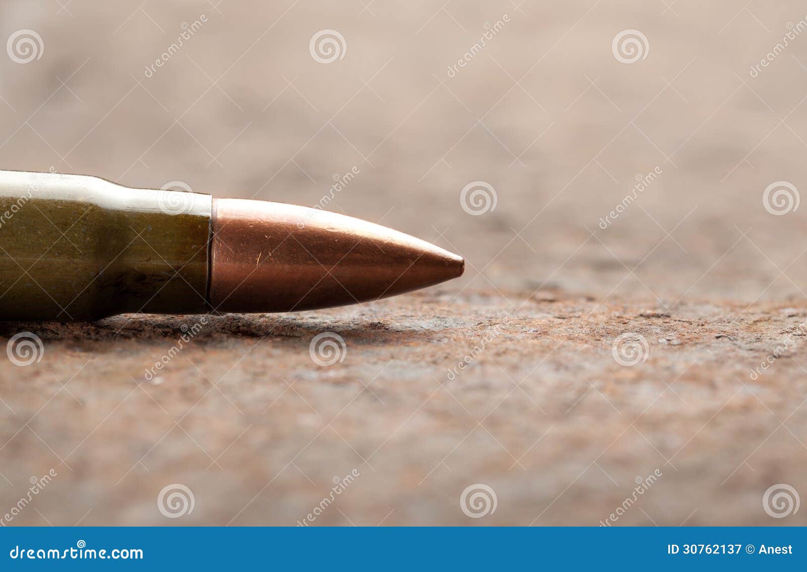 Bullet on Rusted Metal Background Stock Image - Image of dirty ...