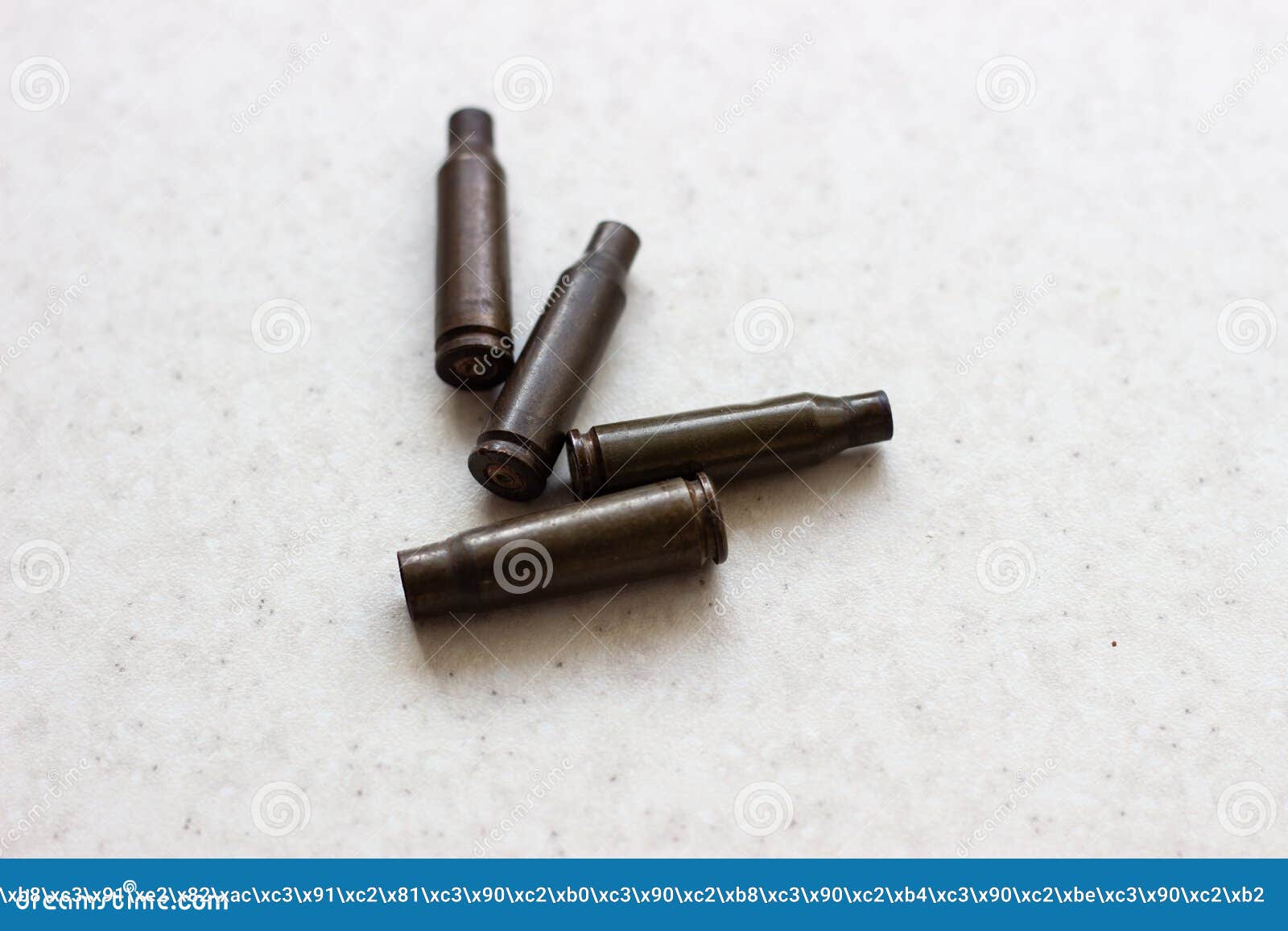 Bullet Shells on a White Surface. Shell Casings on a White Background ...