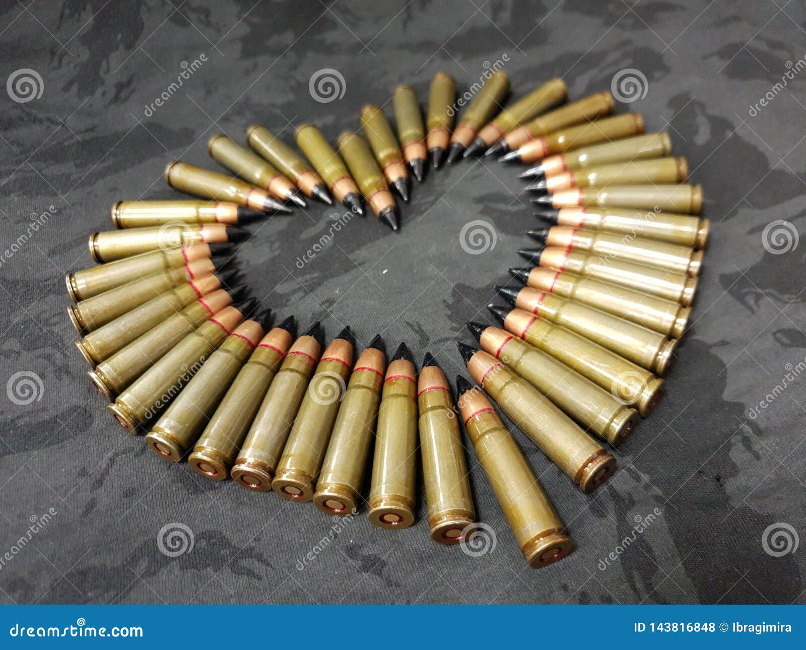 Bullets on the Black Camo in the Shape of a Heart Stock Photo - Image ...