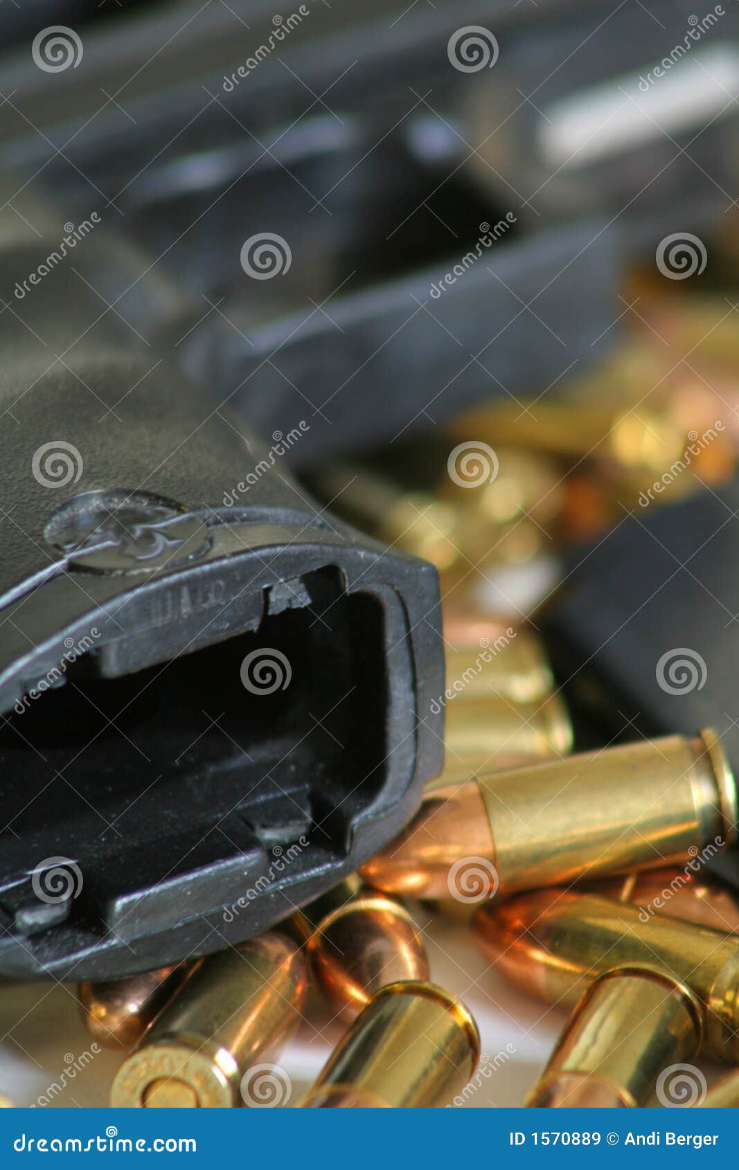 Bullets & gun vertical stock image. Image of firearm - 1570889