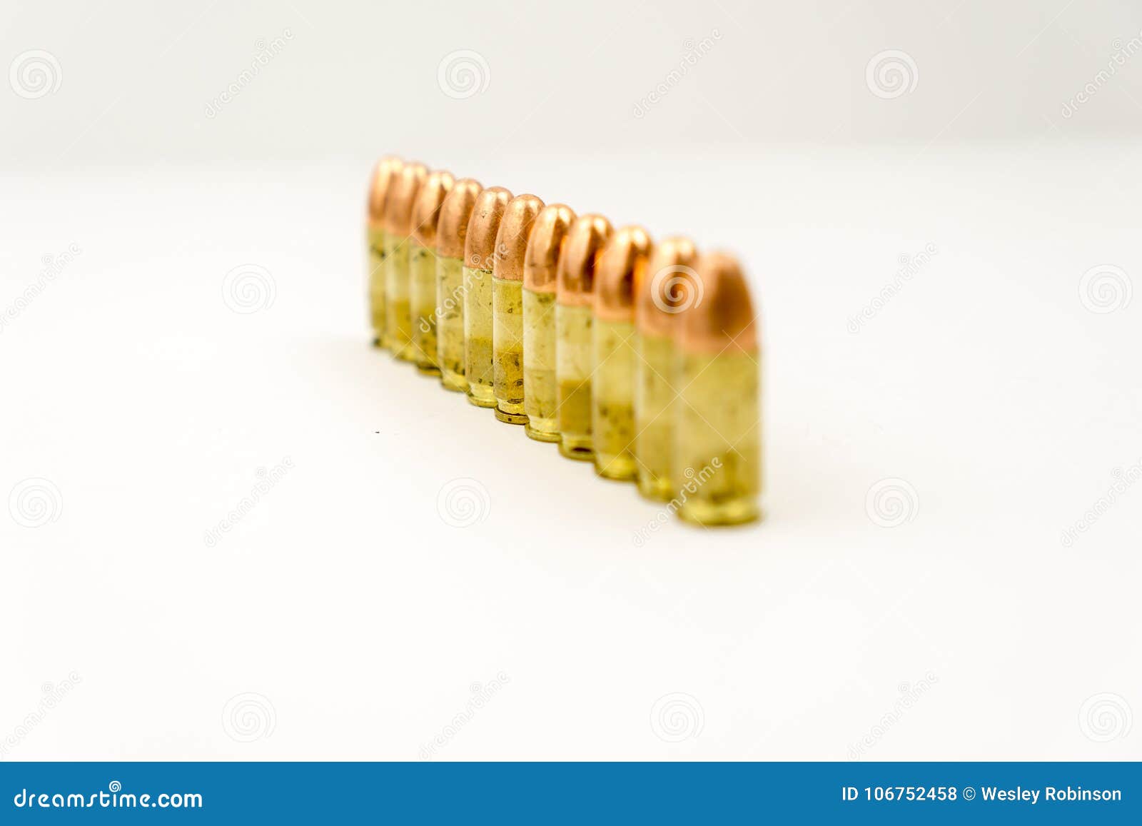 Bullets in a Line stock photo. Image of ammo, pistol - 106752458