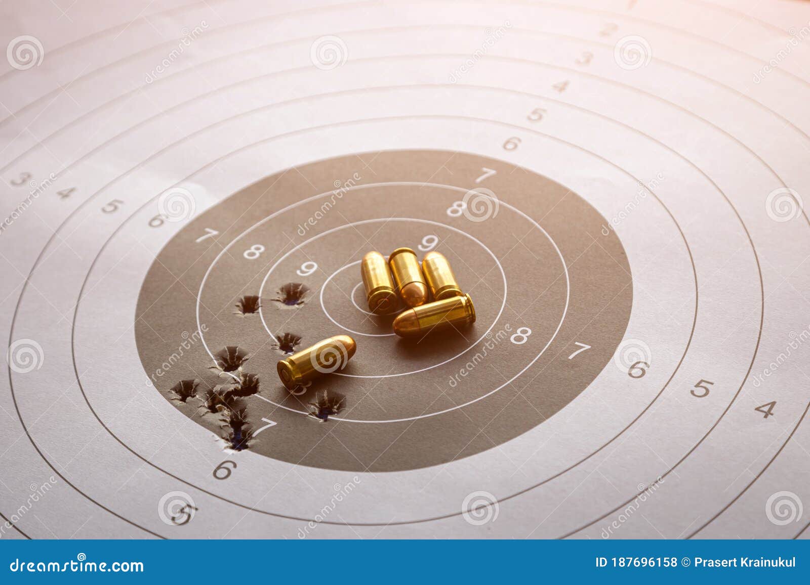 Bullets on Paper Target for Shooting Practice Stock Photo - Image of ...