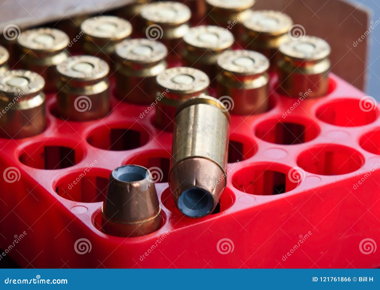 Bullets in a red case stock photo. Image of lead, gold - 121761866