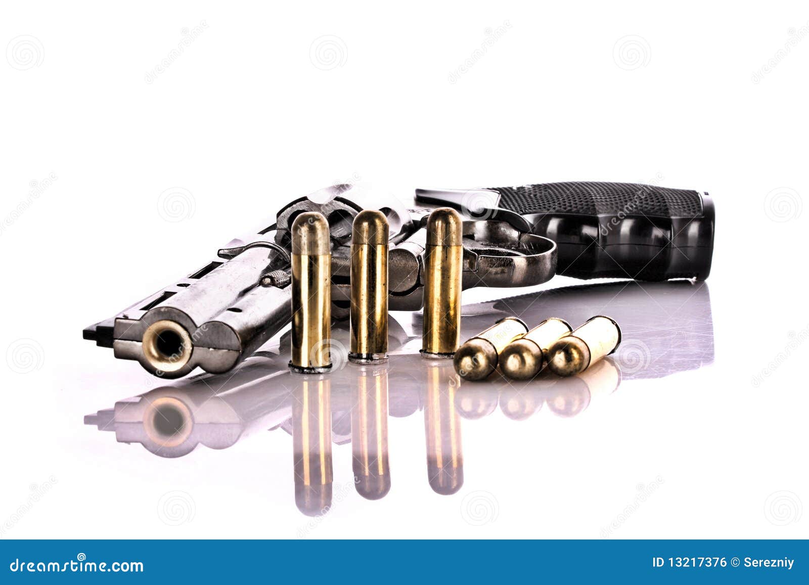Bullets and revolver. stock photo. Image of armed, round - 13217376
