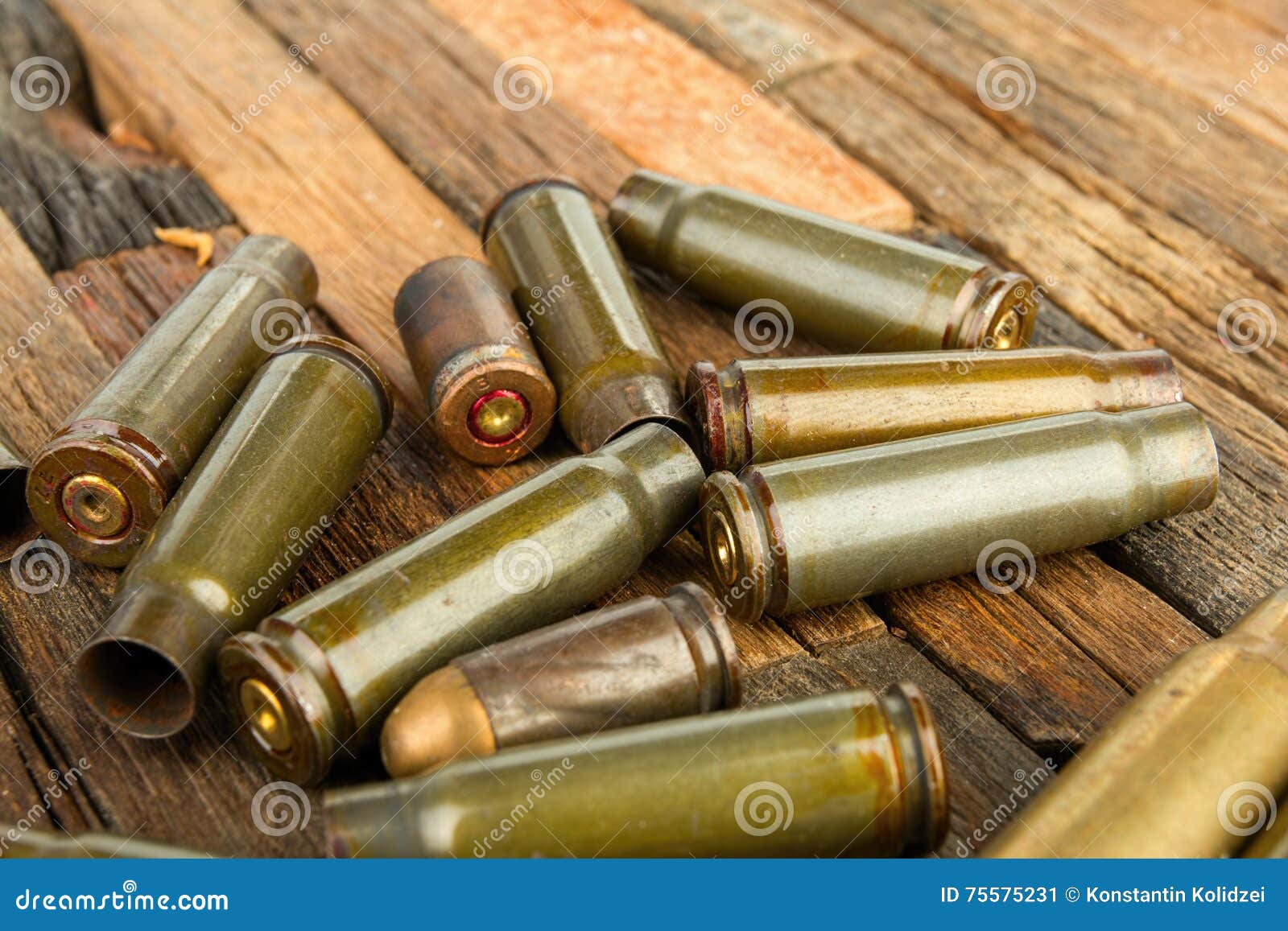 Bullets And Shell Bullets On White Background. A Group Of 9mm Bullets ...