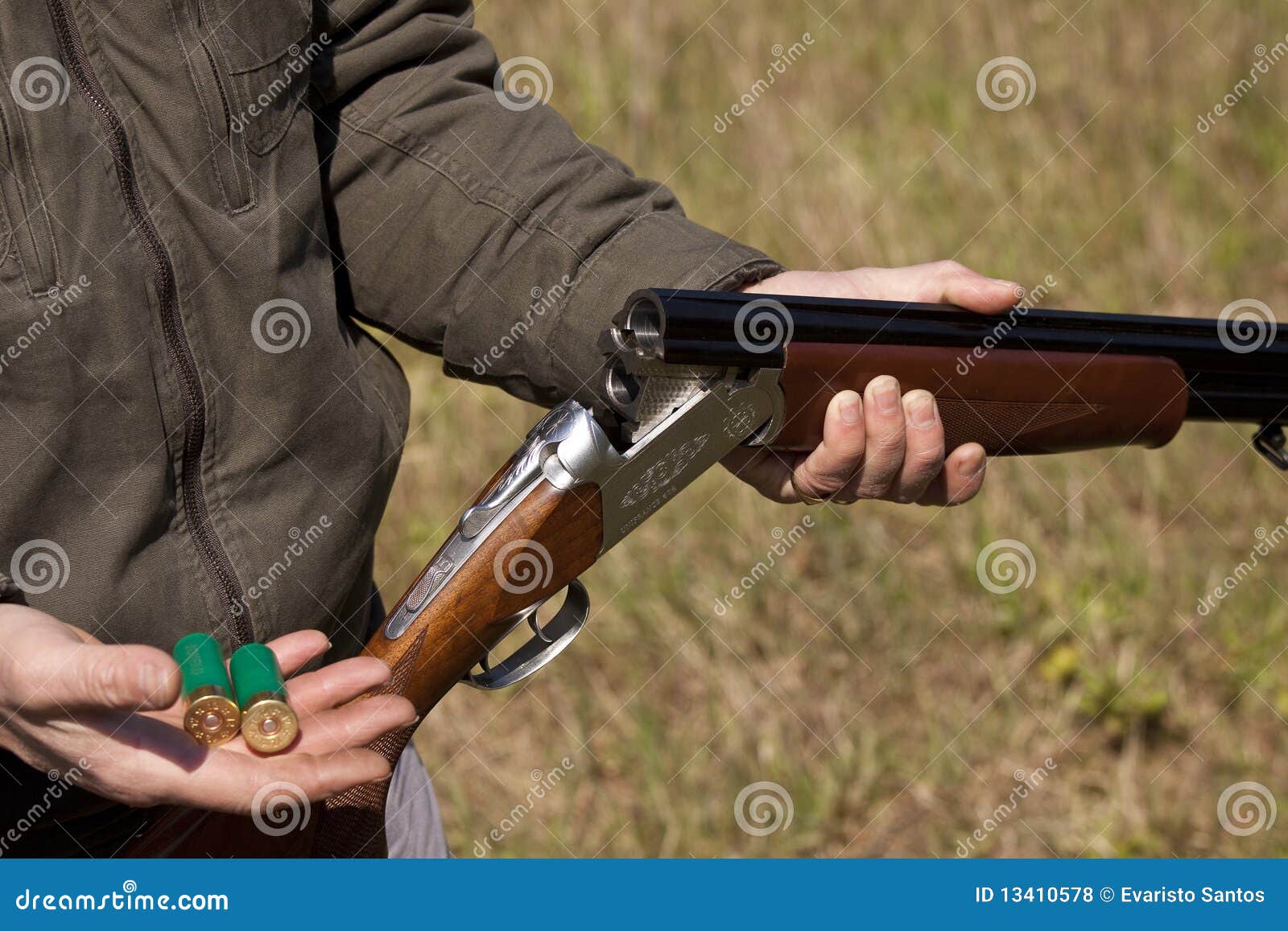 Bullets and shotgun man stock photo. Image of bird, jacket - 13410578