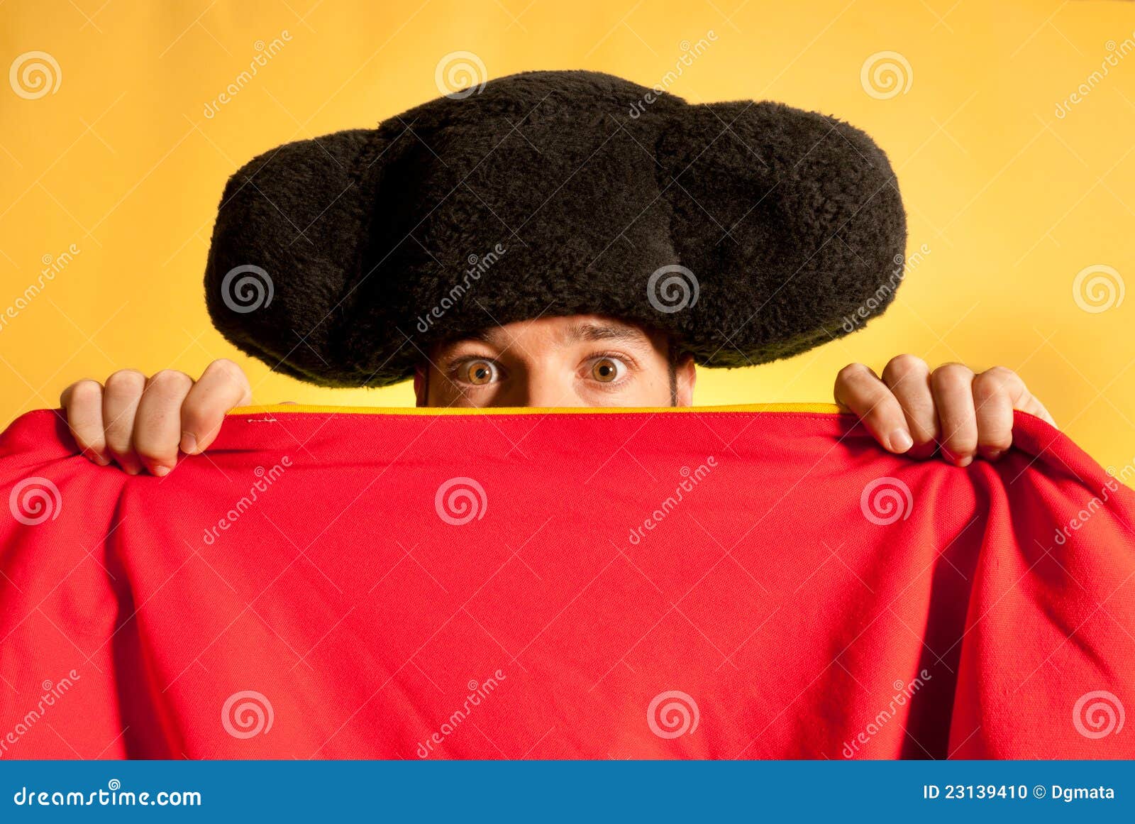 Bullfighter Afraid with Big Hat Hidden Behind Cape Stock Photo - Image ...