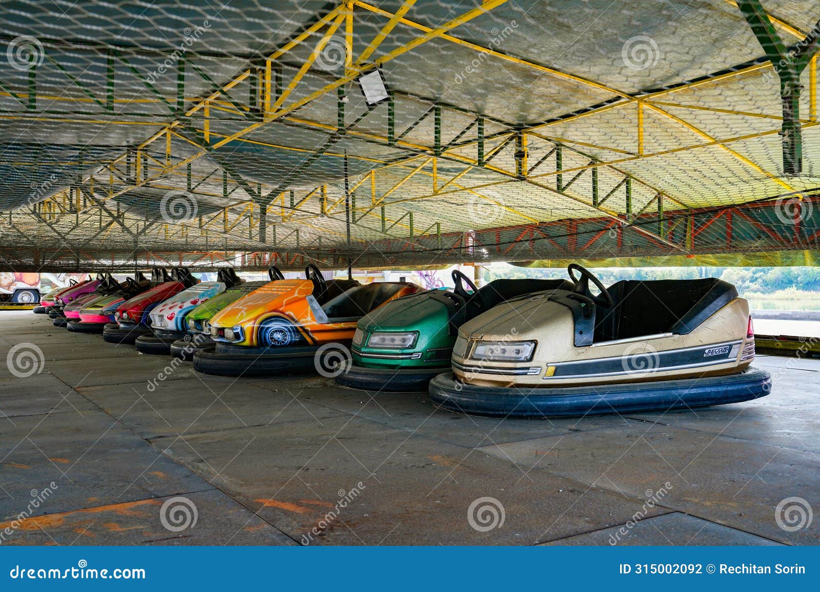ARAD, ROMANIA, 12 APRIL, 2024: Colorful Bumper Cars in Amusement Park ...