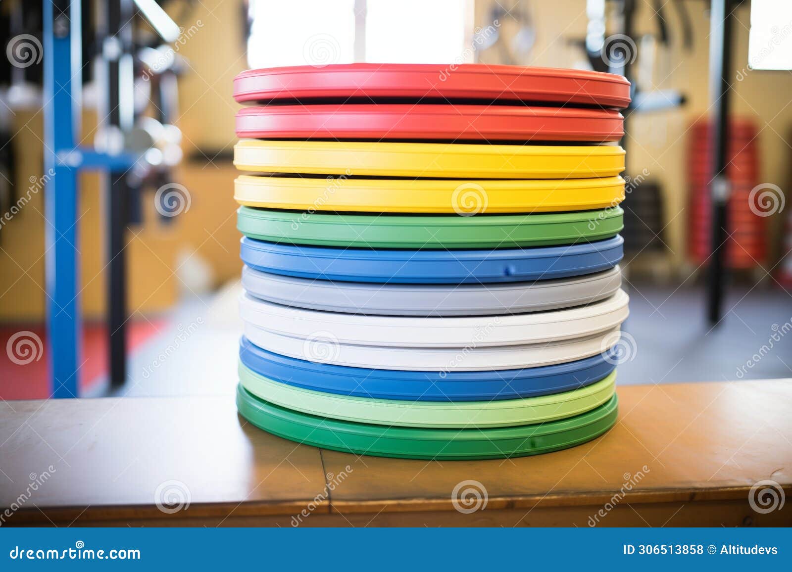 Bumper Plates Stacked in Alternating Colors and Sizes Stock Photo ...