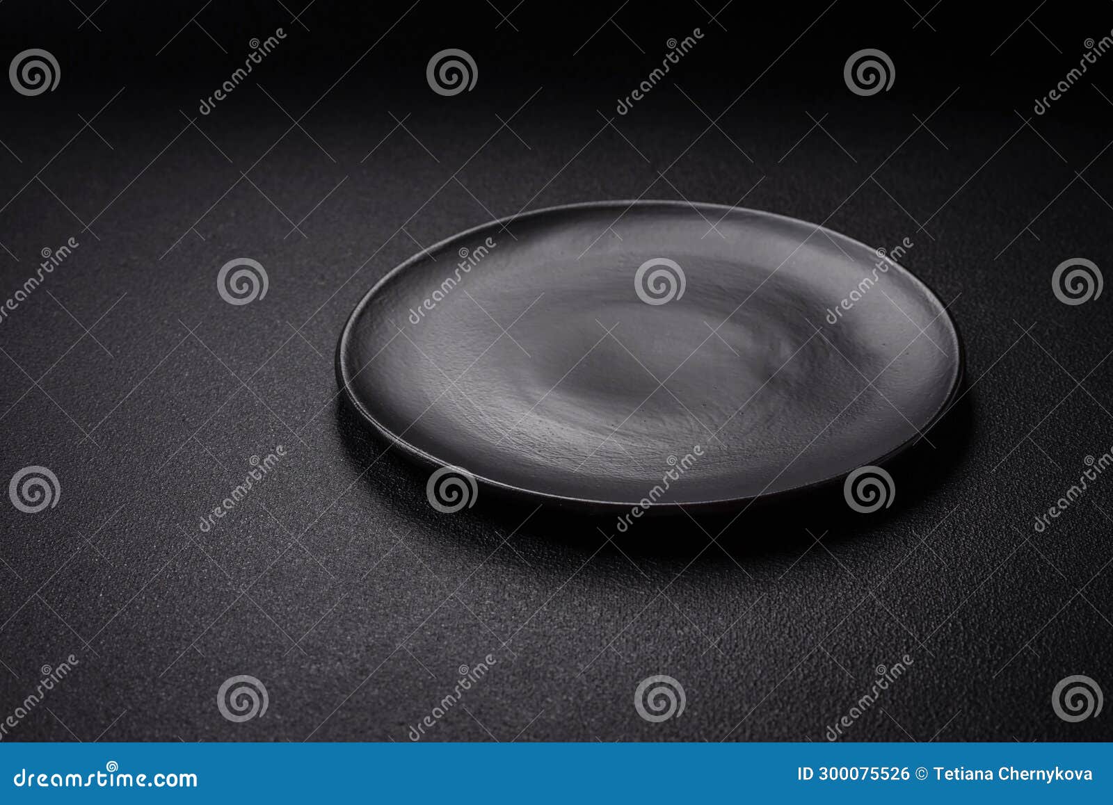 Bumpy Empty Ceramic Plate on a Textured Concrete Background Stock Photo ...