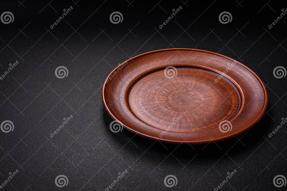 Bumpy Empty Ceramic Plate on a Textured Concrete Background Stock Photo ...