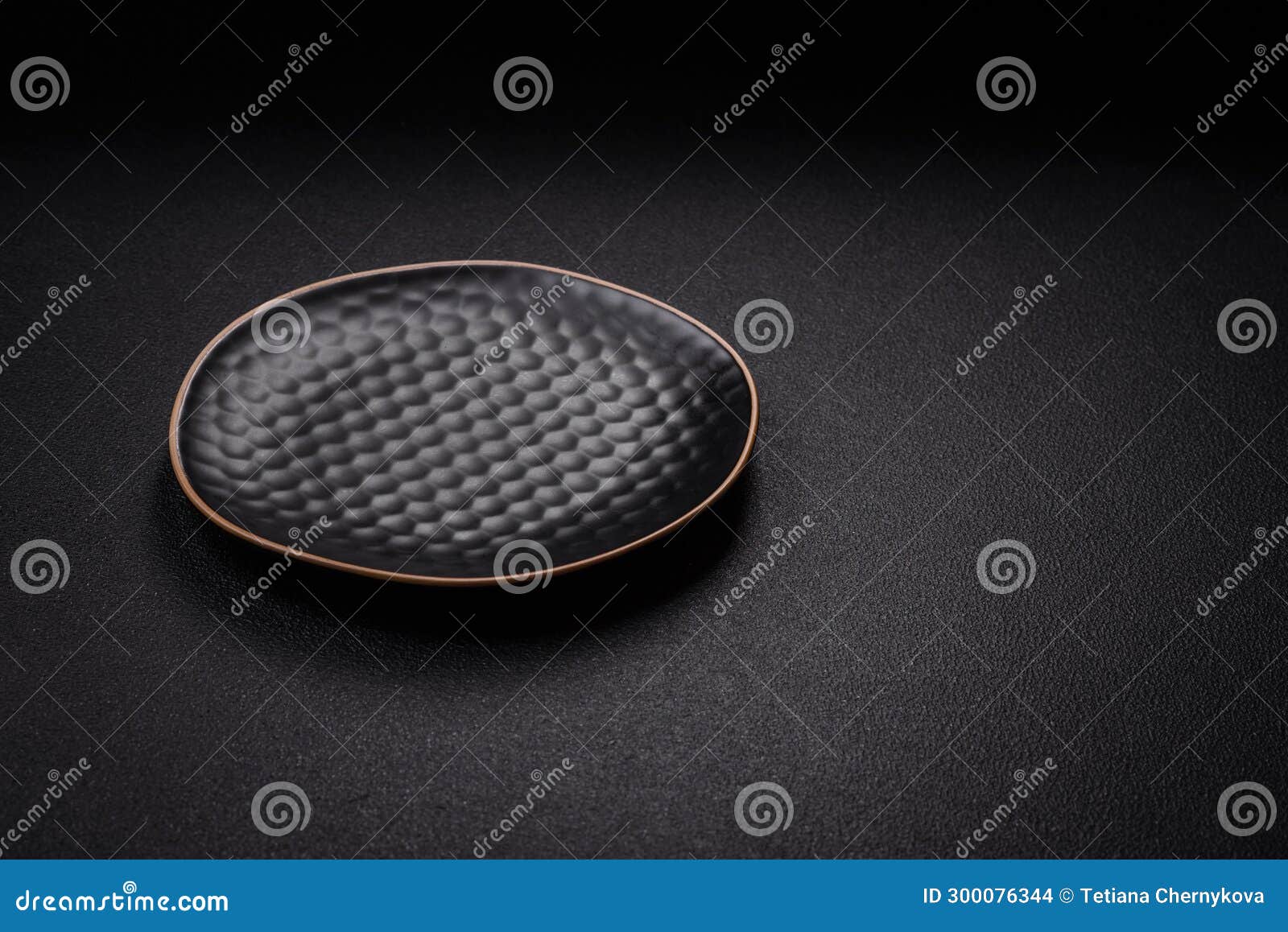 Bumpy Empty Ceramic Plate on a Textured Concrete Background Stock Photo ...