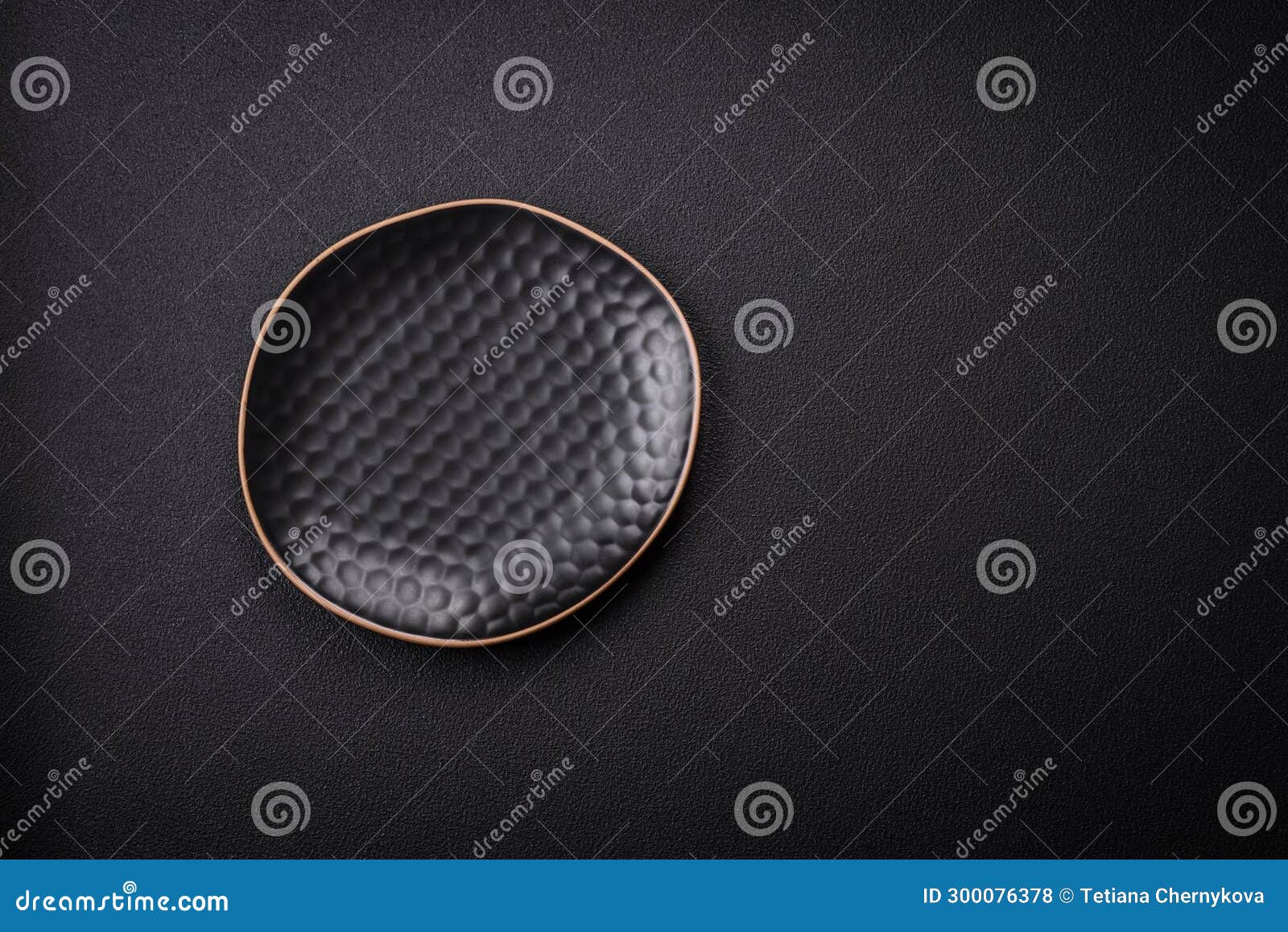 Bumpy Empty Ceramic Plate on a Textured Concrete Background Stock Photo ...