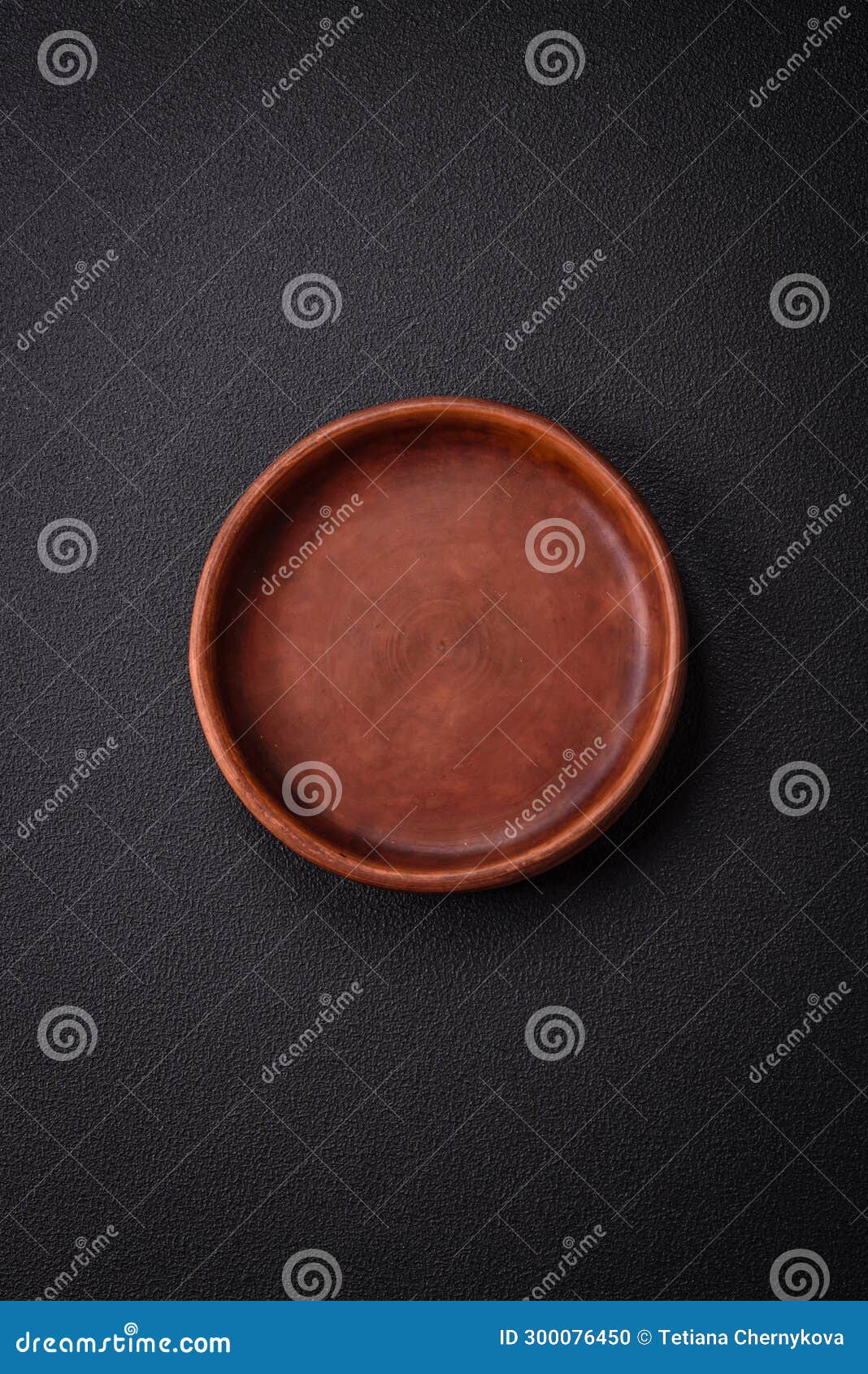 Bumpy Empty Ceramic Plate on a Textured Concrete Background Stock Photo ...