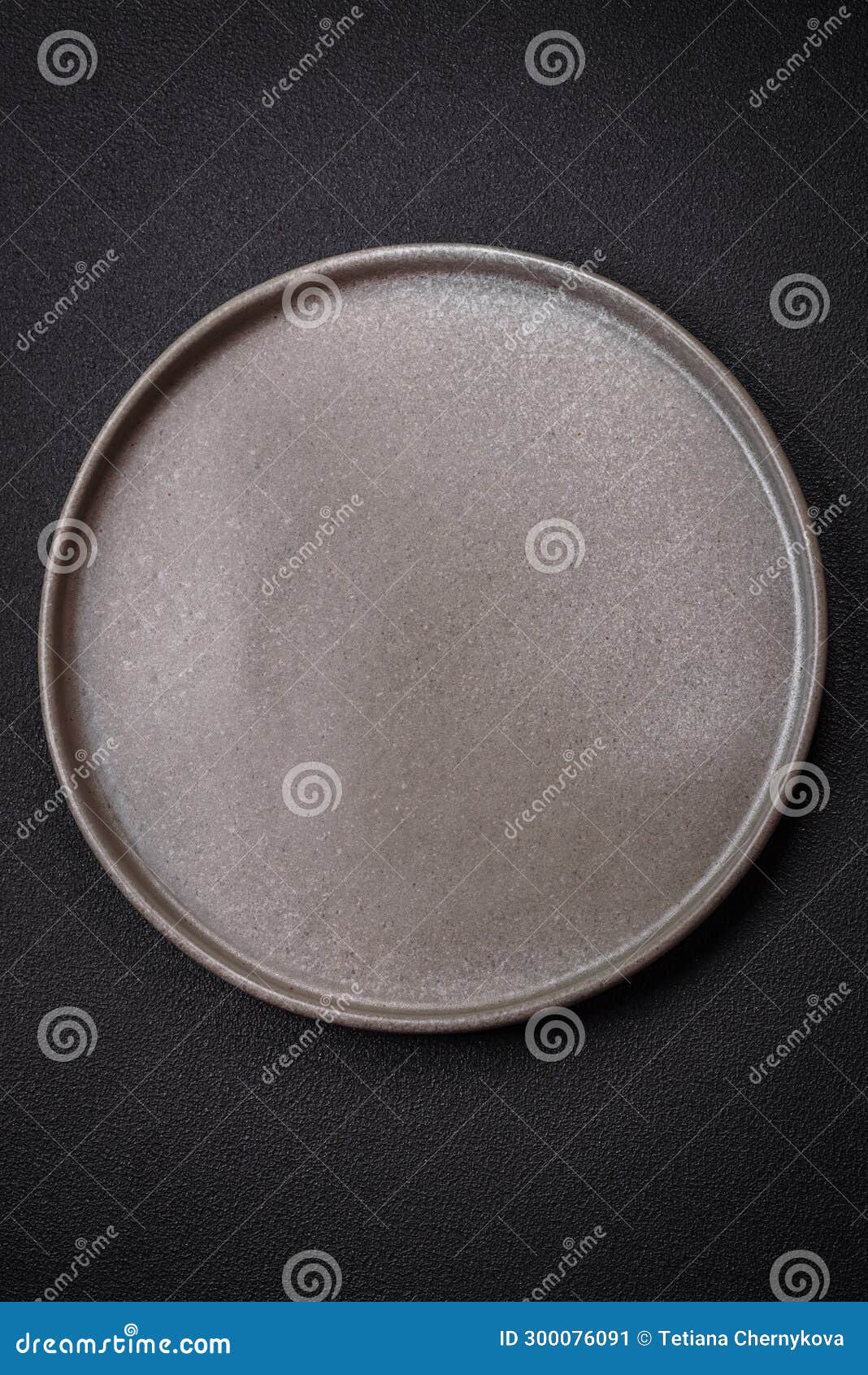 Bumpy Empty Ceramic Plate on a Textured Concrete Background Stock Image ...