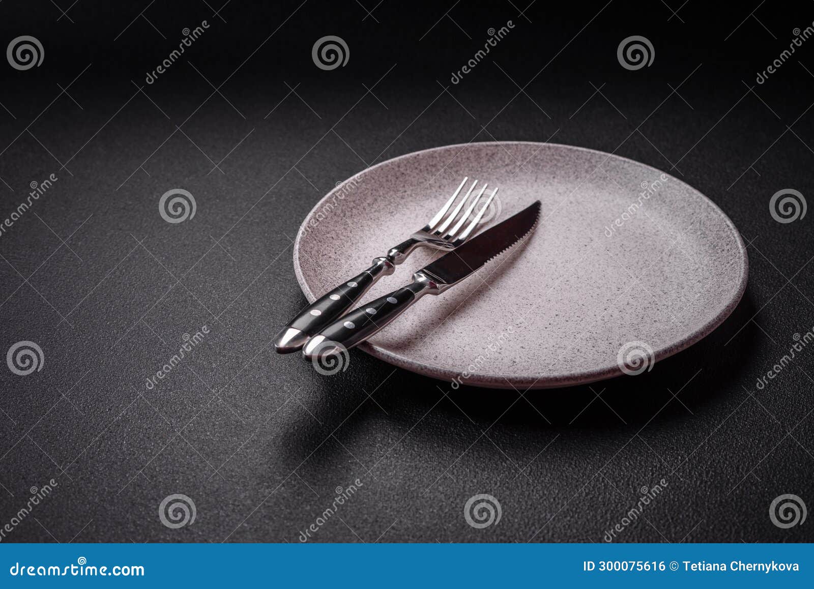 Bumpy Empty Ceramic Plate on a Textured Concrete Background Stock Photo ...