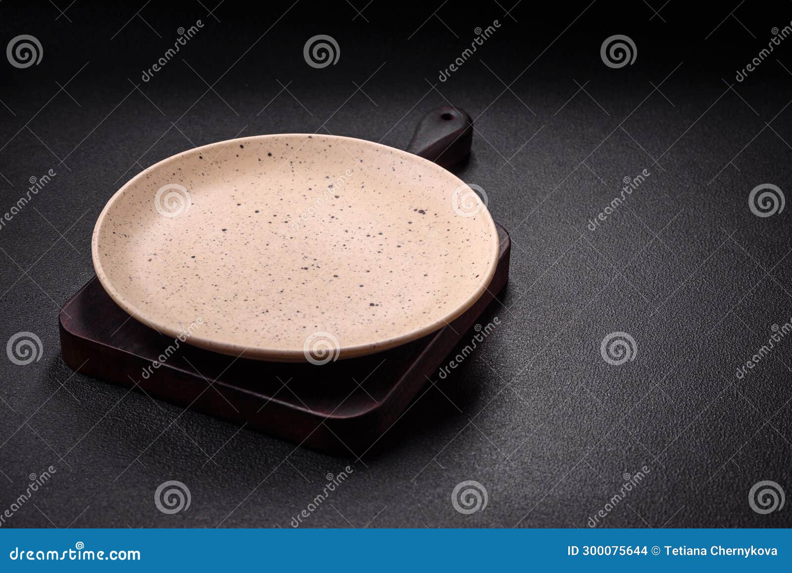 Bumpy Empty Ceramic Plate on a Textured Concrete Background Stock Photo ...