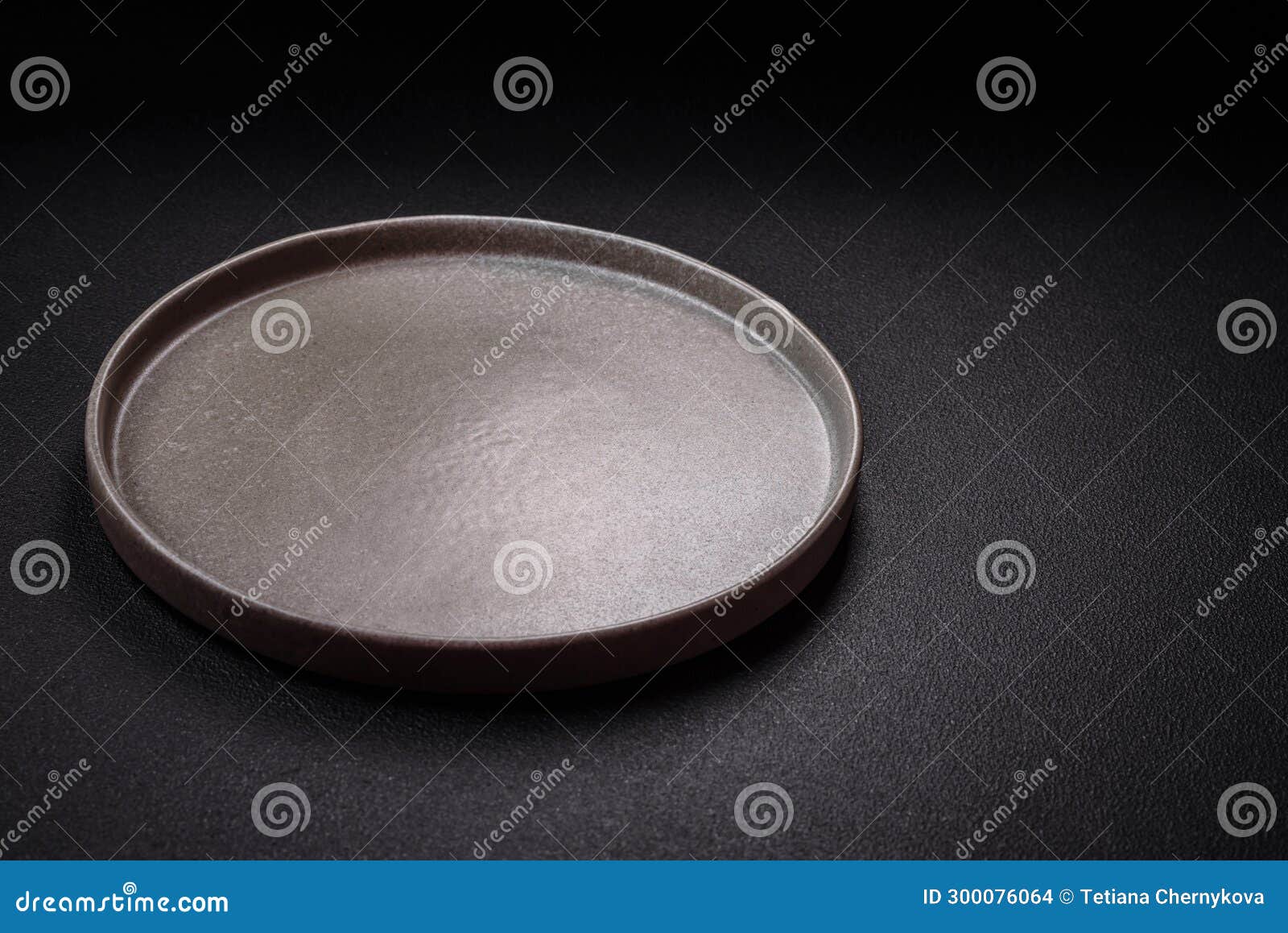 Bumpy Empty Ceramic Plate on a Textured Concrete Background Stock Photo ...
