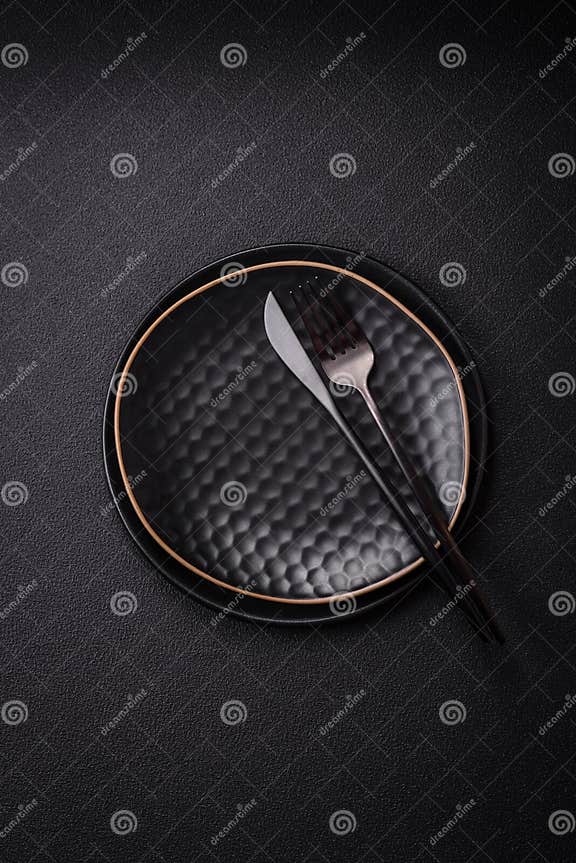 Bumpy Empty Ceramic Plate on a Textured Concrete Background Stock Photo ...