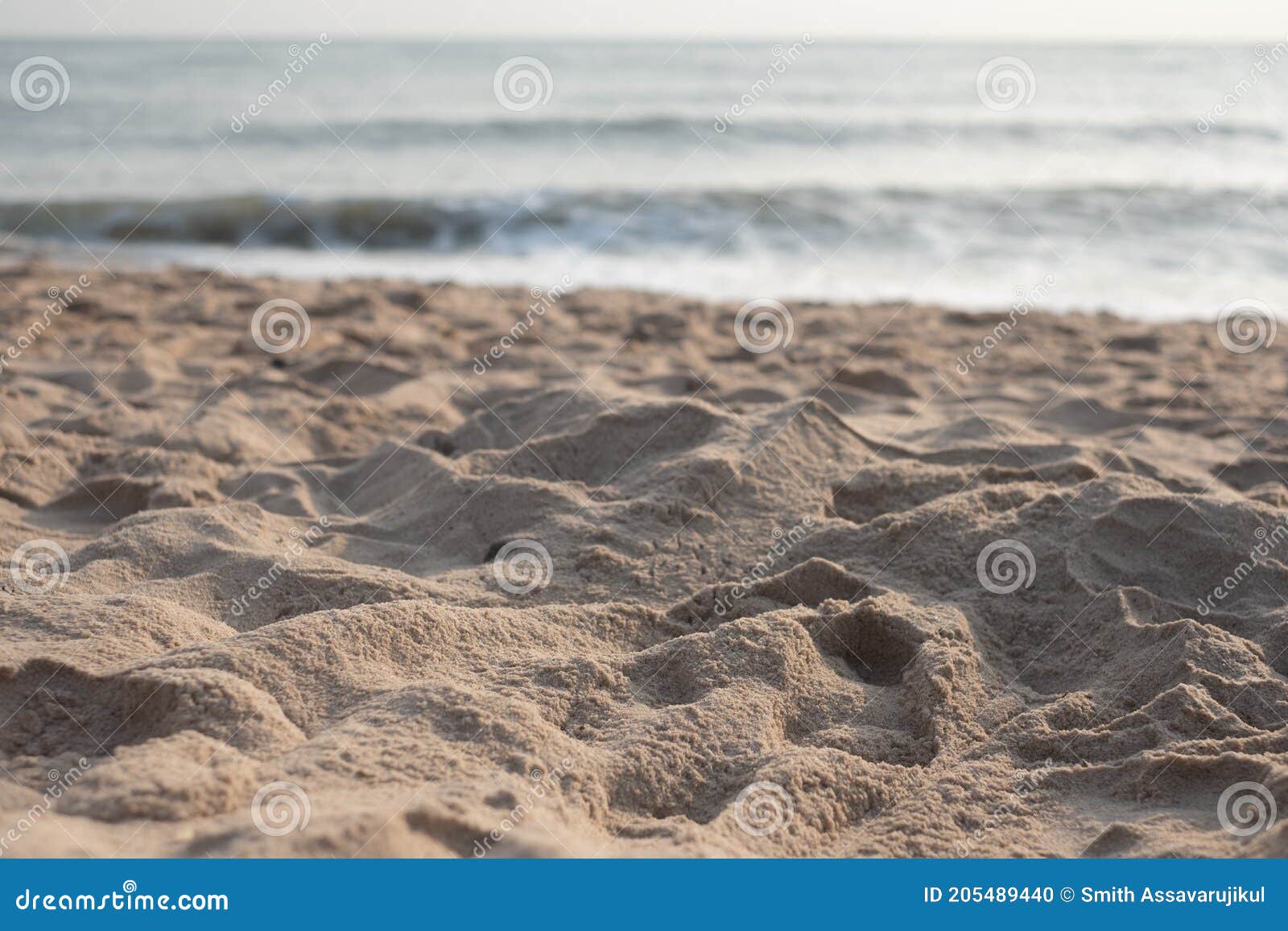 Bumpy Tropical Sandy Beach with Blurry Blue Ocean and Sky Stock Photo ...