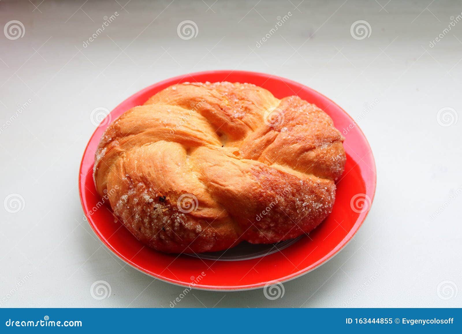 Bun on a Plate on the Table. Stock Image - Image of form, color: 163444855