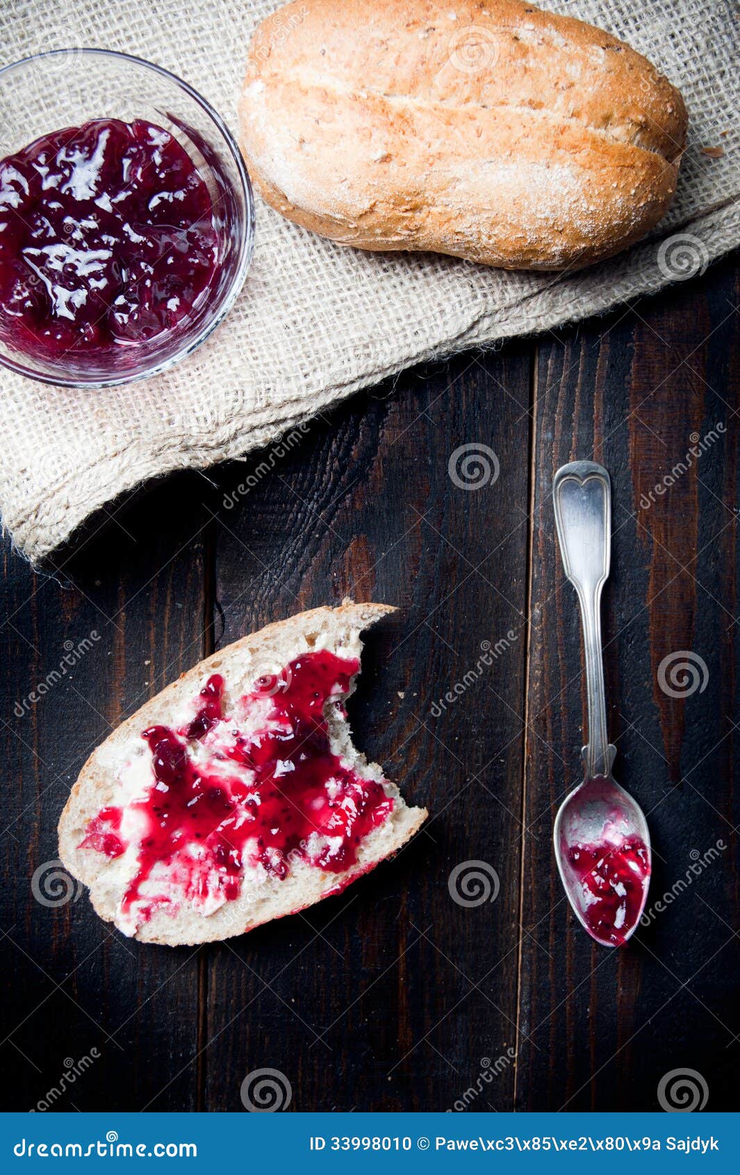 Bun with Sweet Jam for Breakfast Stock Photo - Image of diet, black ...