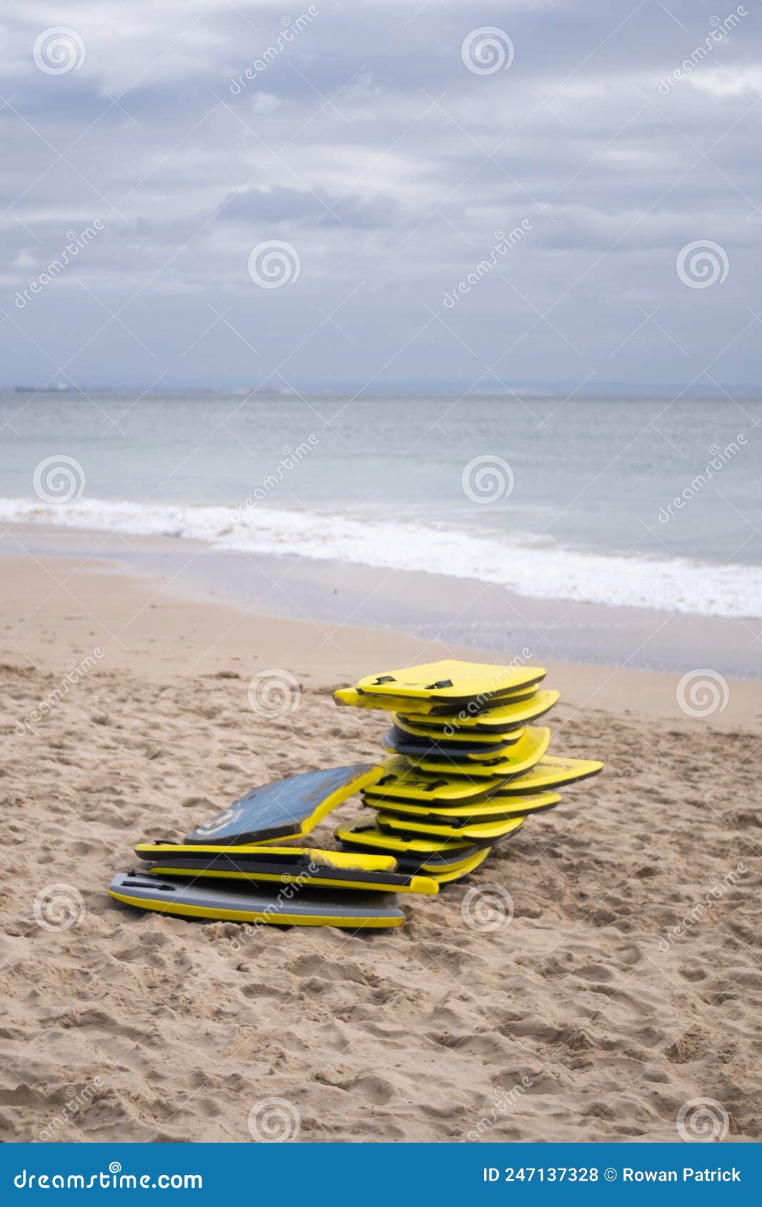 Yellow Stack of Body Boards Stock Photo - Image of motion, people ...