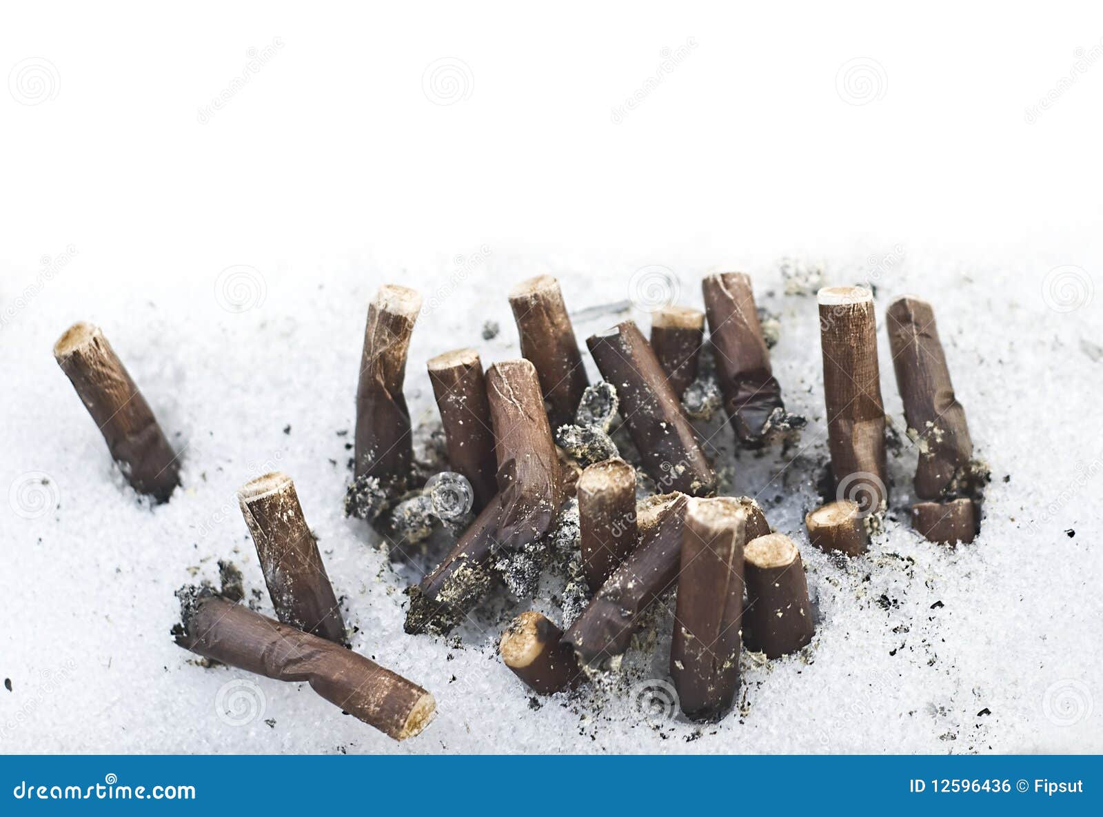 Bunch of Brown Cigarette Butts in Snow Stock Photo - Image of isolated ...