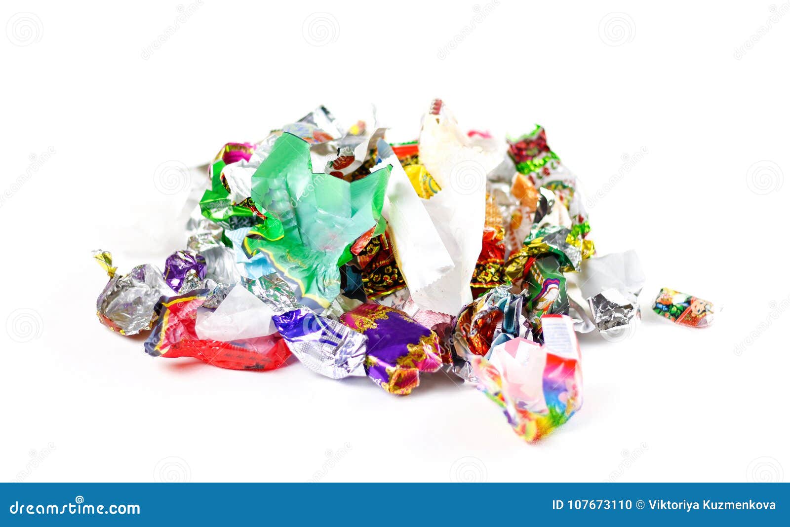 A Bunch of Candy Wrappers on a White Background. Closeup Stock Photo ...