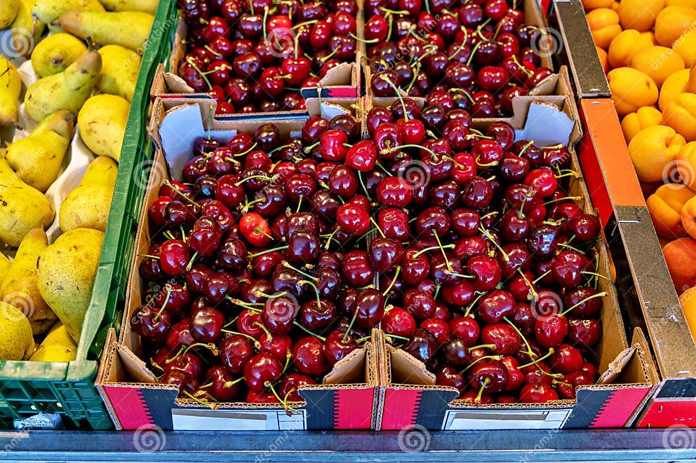 Bunch of Cherries are in Boxes on Shelf in Store Stock Image - Image of ...