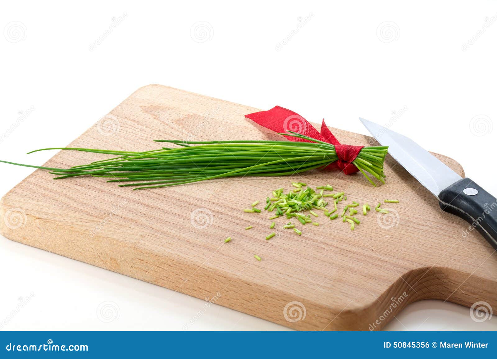 Bunch of Chives and Kitchen Knife on a Cutting Board Stock Photo ...