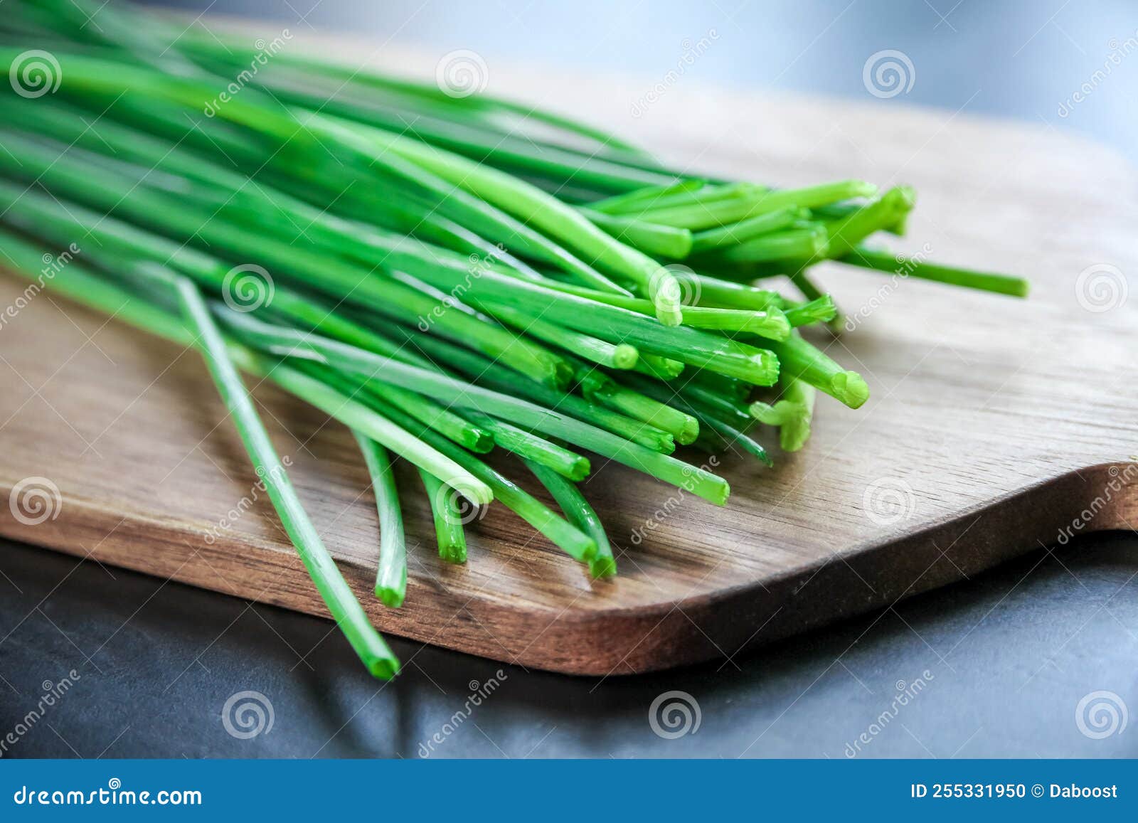 Bunch of Chives on a Wooden Cutting Board Stock Photo - Image of green ...