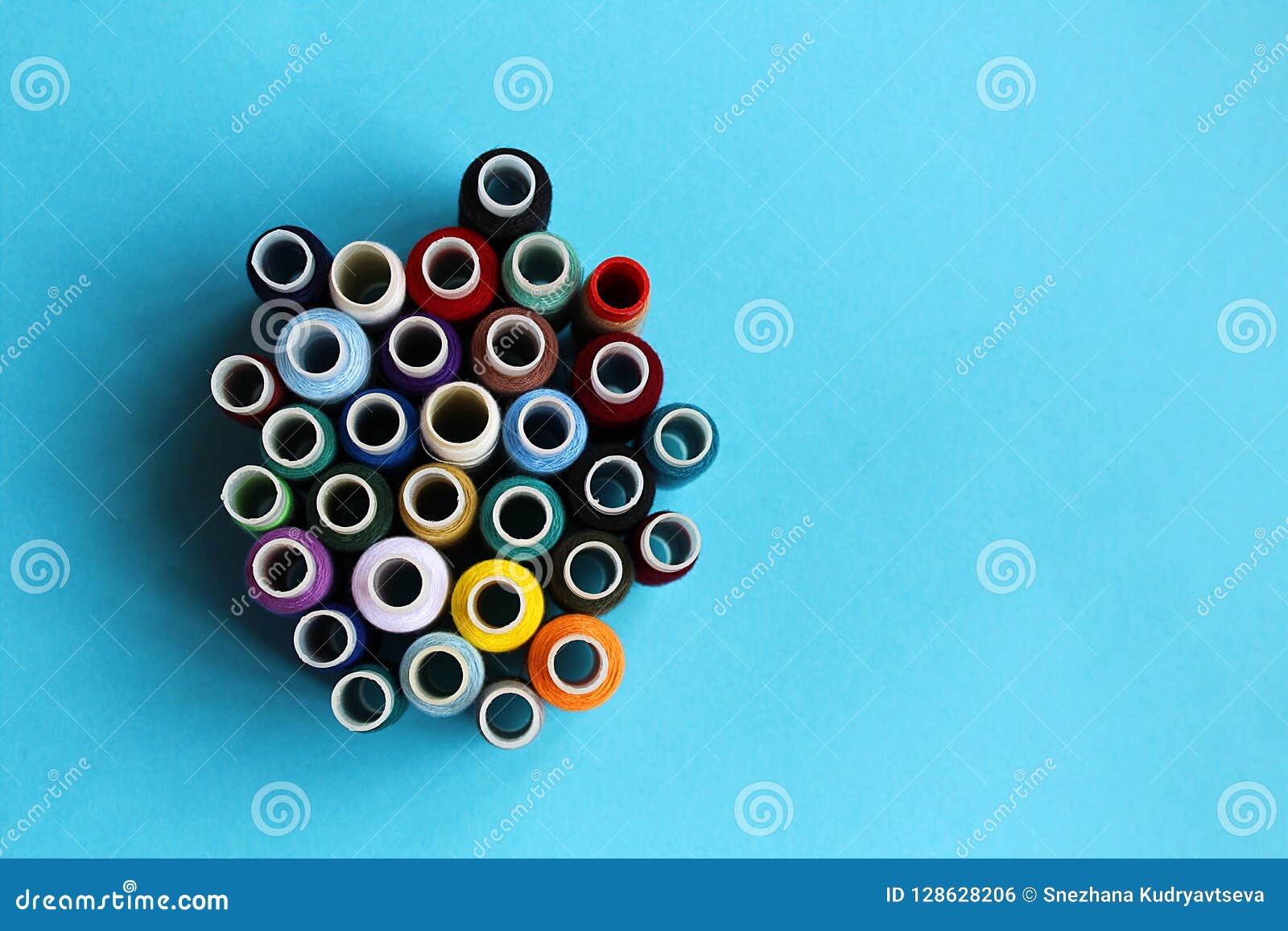 A Bunch of Colored Sewing Threads for a Seamstress Stock Photo - Image ...