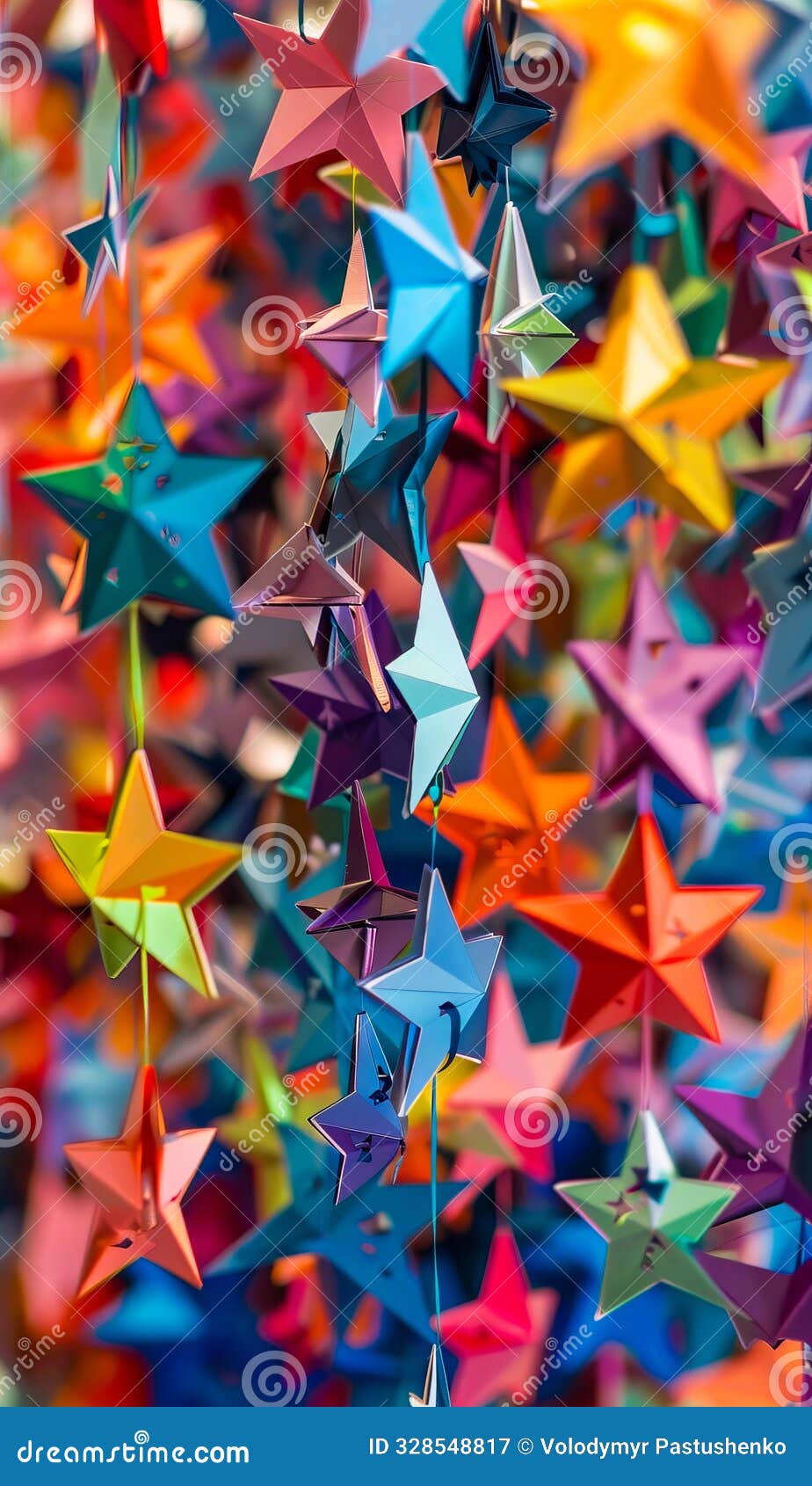 A Bunch of Colorful Paper Stars Hanging from a String Stock Image ...