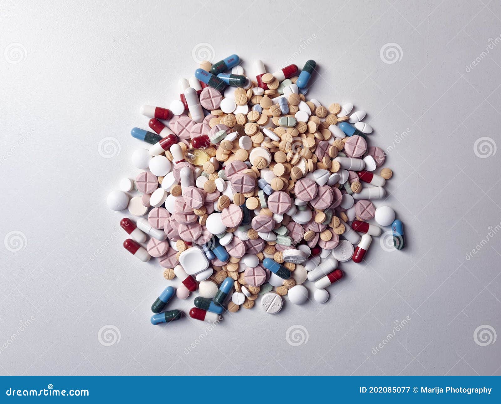 A Bunch of Colorful Tablets and Capsules Isolated on a White Background ...