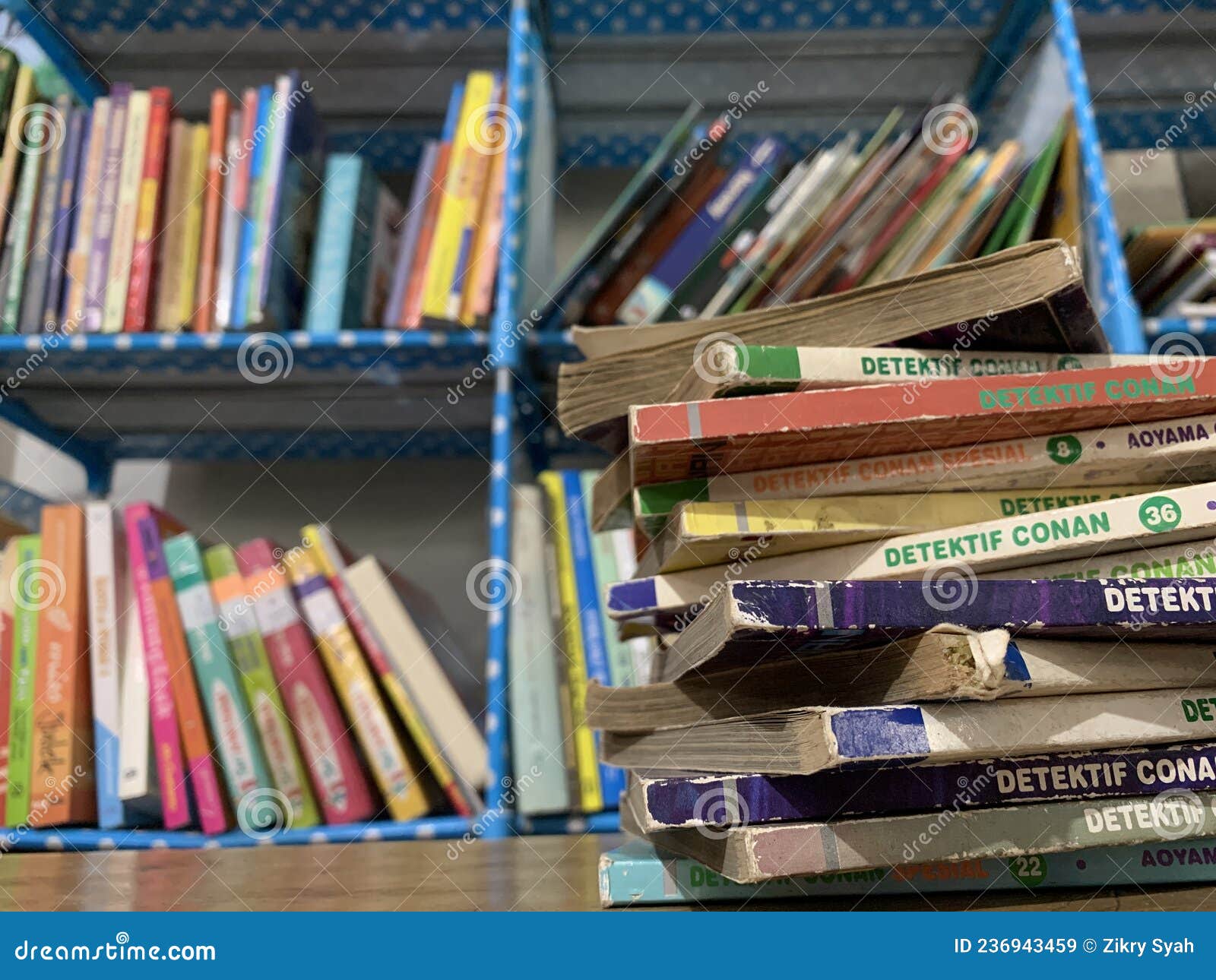 Pile of Comic Books Near the Bookshelf Editorial Stock Image - Image of ...
